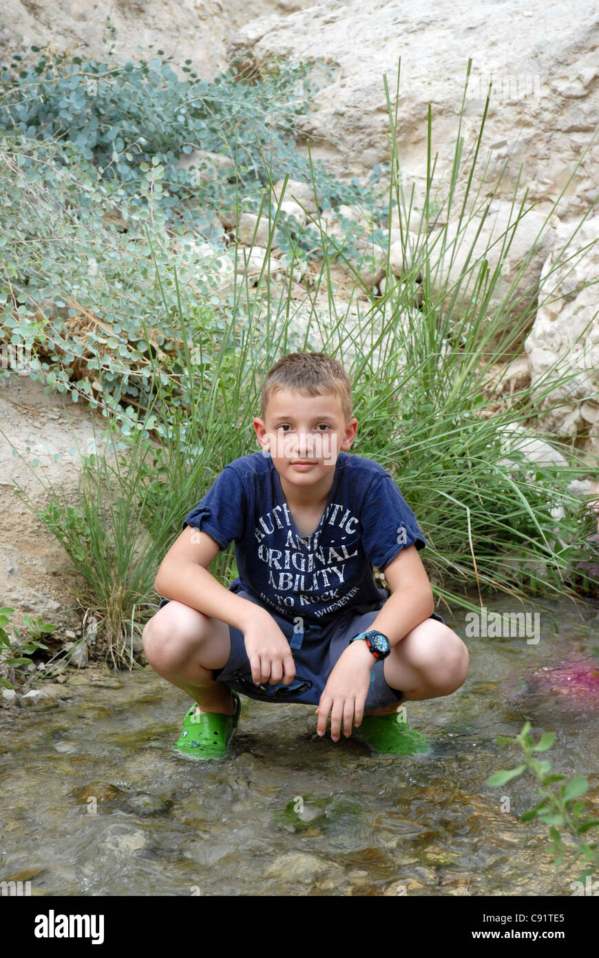 Boy posing on the nature Stock Photo - Alamy
