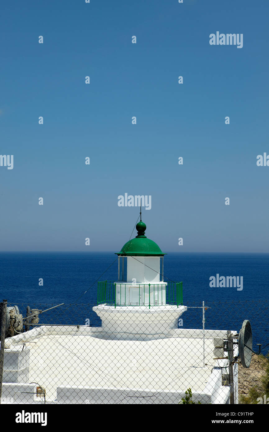 The clifftop lighthouse at Drepano overlooks the Souinon cape, and was ...