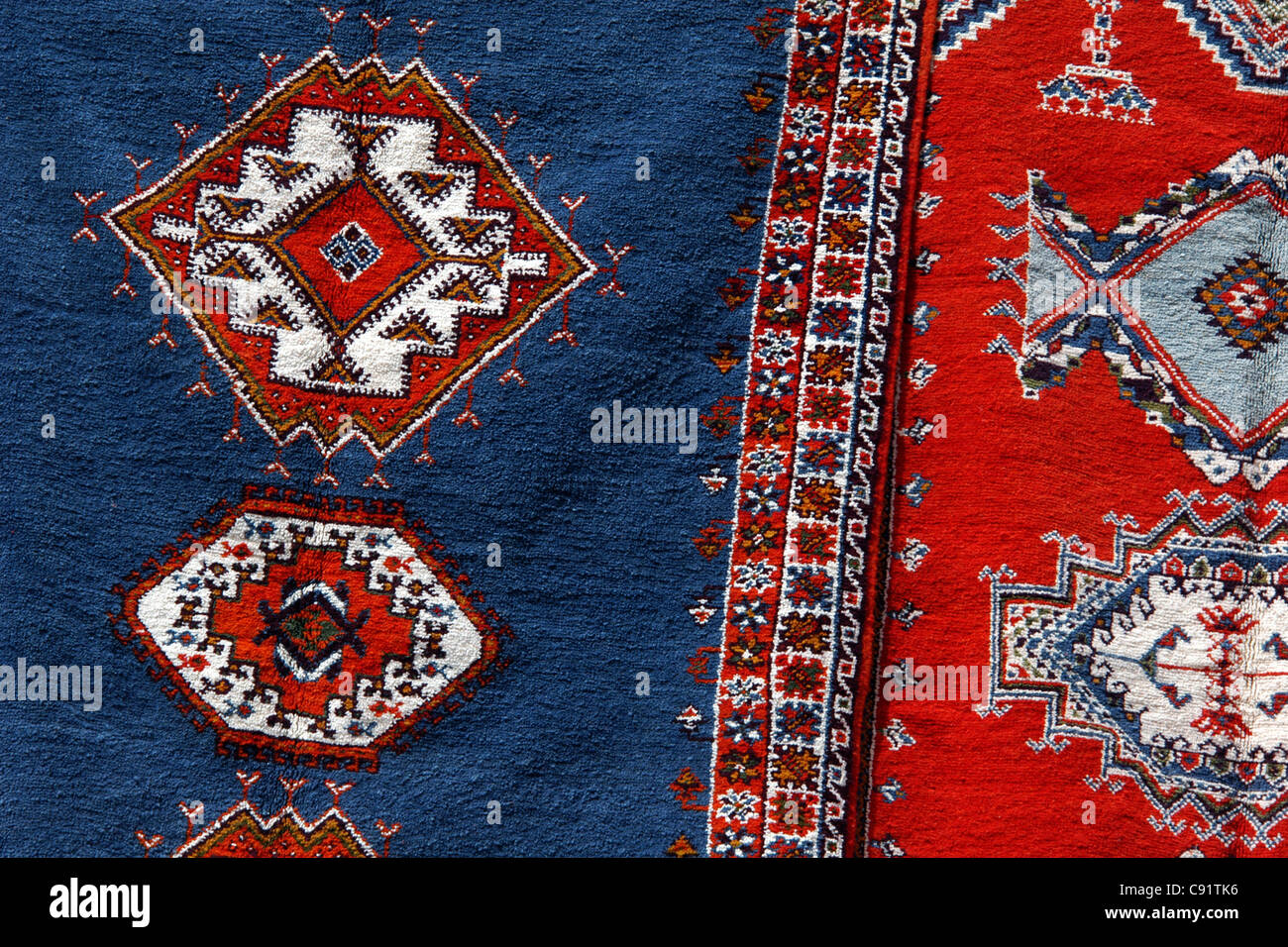 Moroccan carpets at the traditional Moroccan souk (street market) in ...