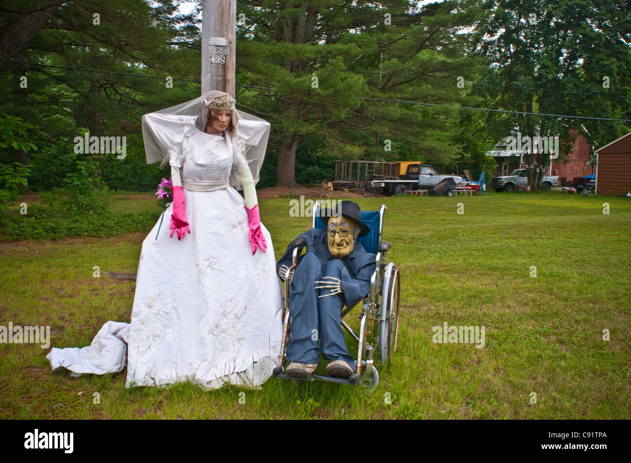 Strange Halloween bride and groom costume couple. Grotesque old man in ...
