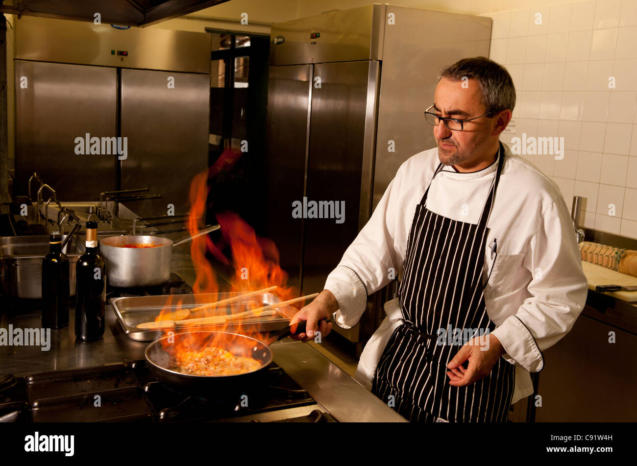 Chef cooking flame hi-res stock photography and images - Alamy