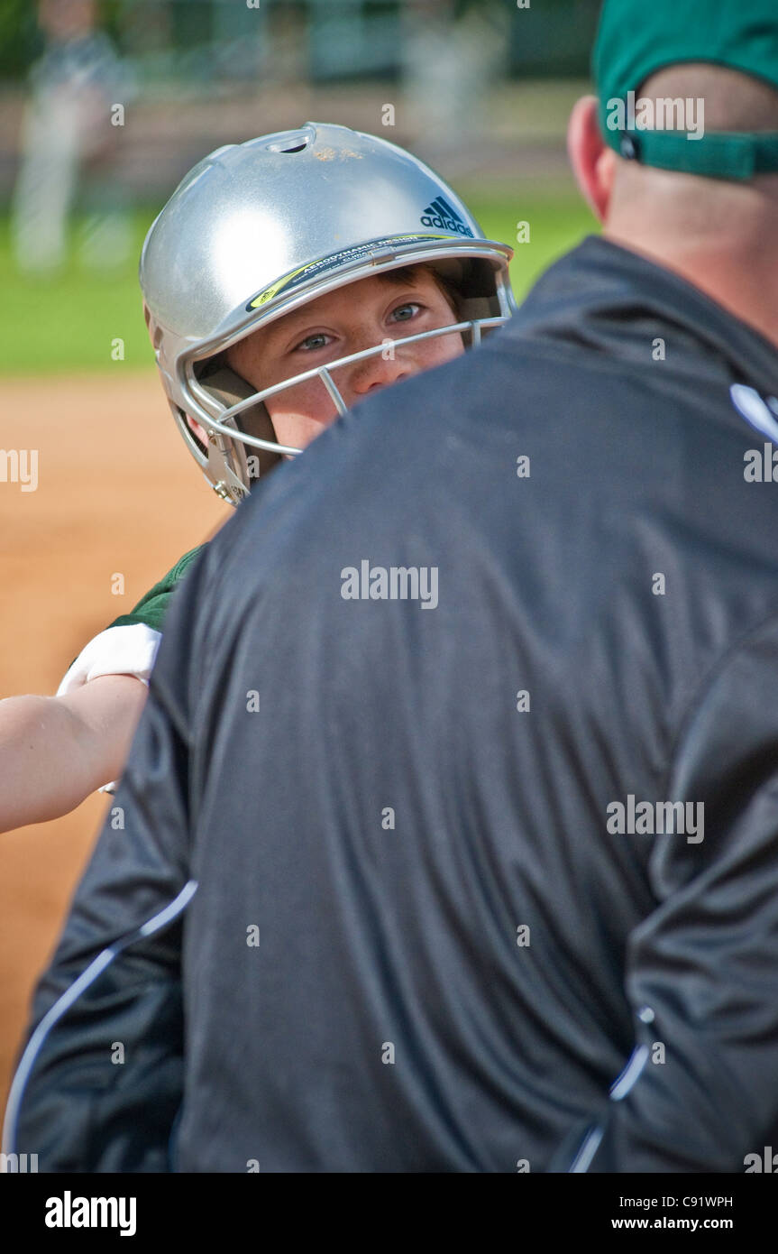 Young boy and coach Stock Photo - Alamy
