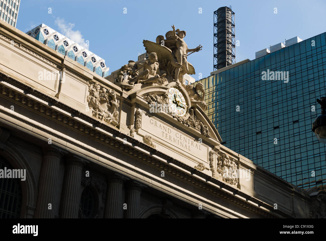 Exterior facade of Grand Central Station showing clock with statue of ...