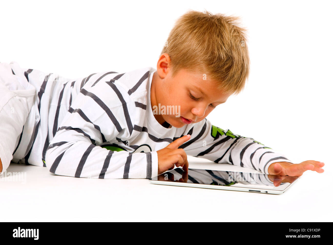 little boy using digital tablet Stock Photo - Alamy