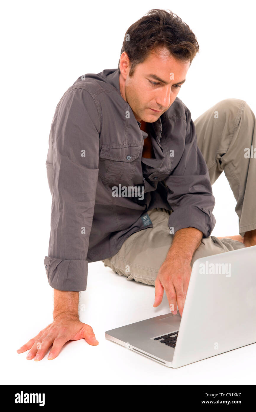 man using laptop Stock Photo - Alamy