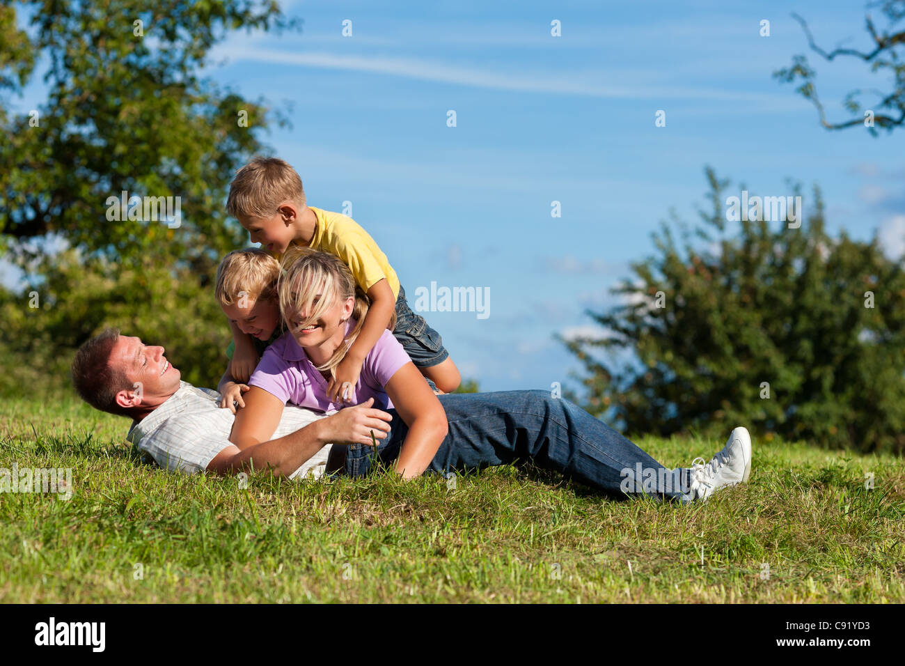 Children playing in a meadow hi-res stock photography and images - Alamy