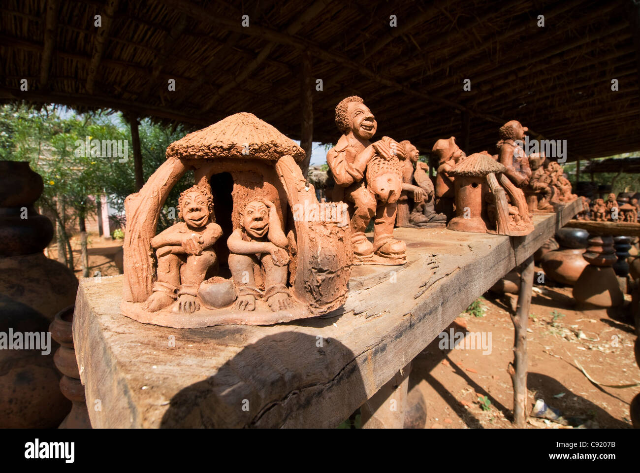 Local pottery and wood crafts are sold on the roadside between Thyolo ...