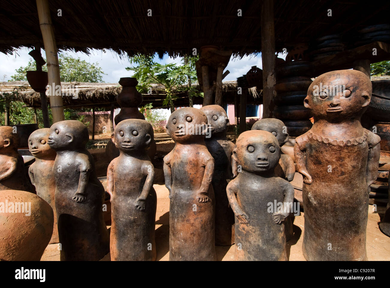 Local pottery and wood crafts are sold on the roadside between Thyolo ...