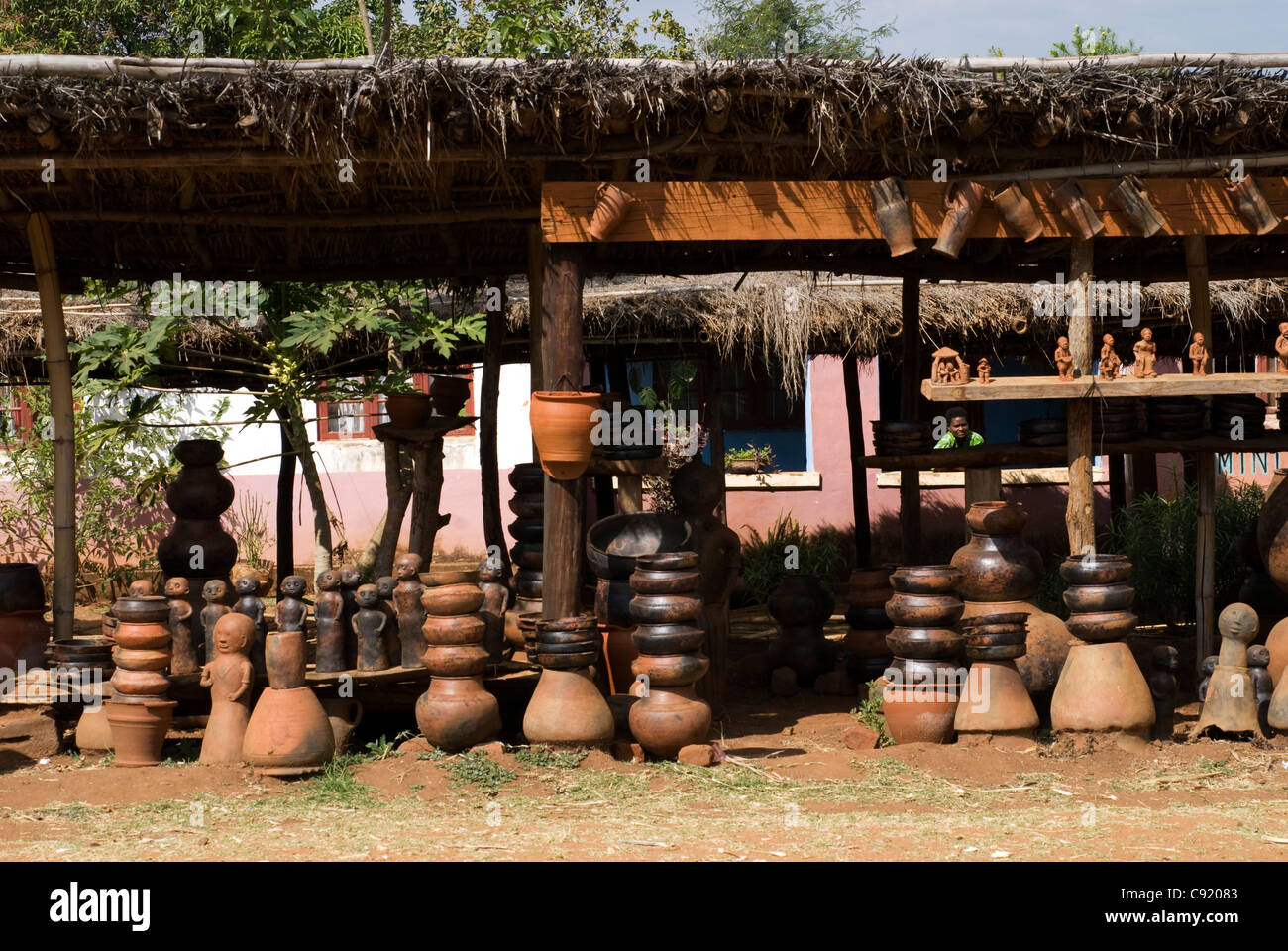 Local pottery and wood crafts are sold on the roadside between Thyolo ...