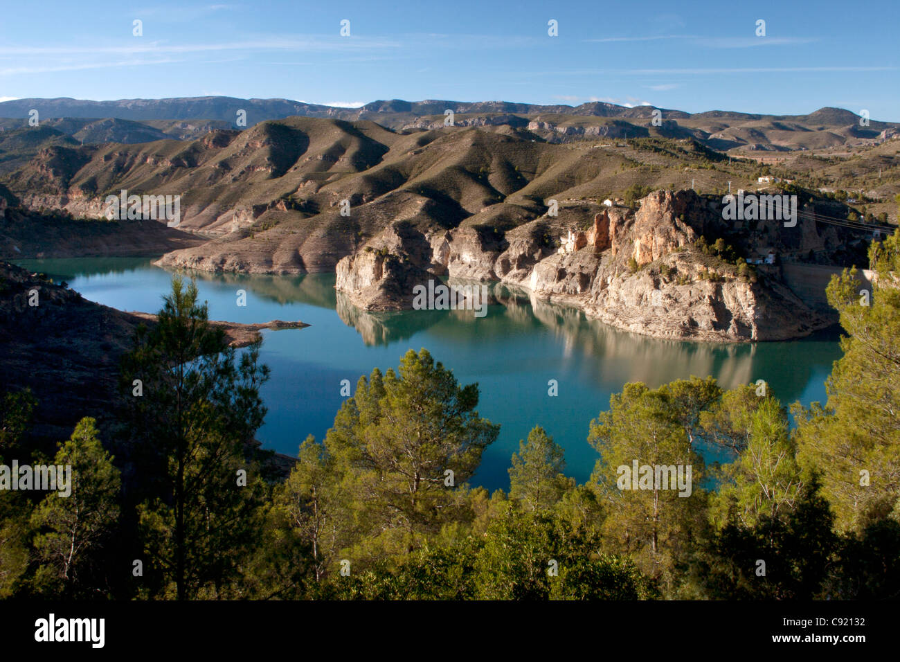 The reservoir Pantano de la Fuensanta is in a flooded valley in the ...