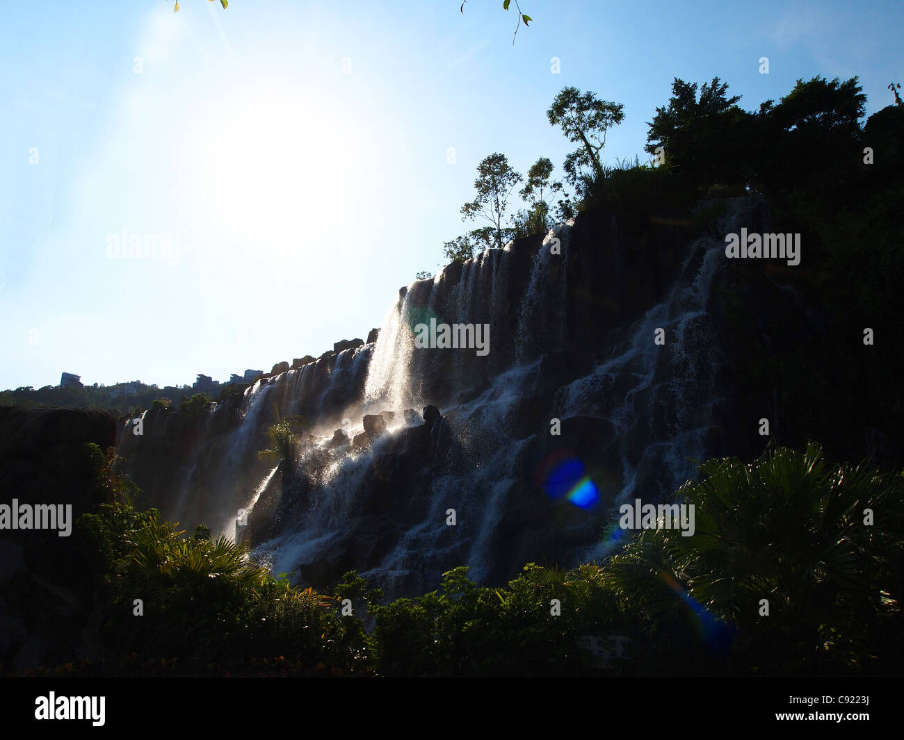 Waterfall under Sunshine Stock Photo - Alamy