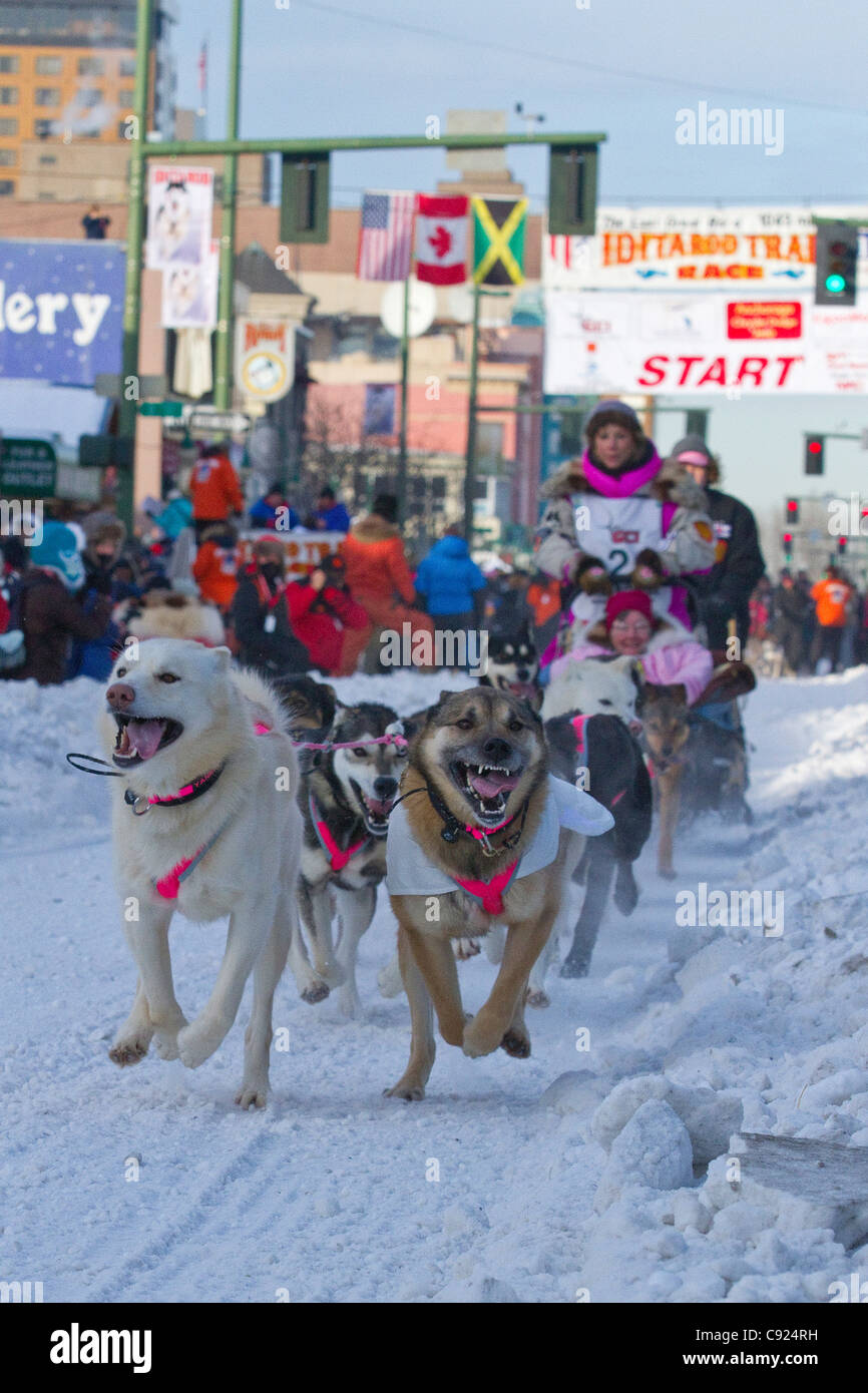 Dee Dee Jonrowe mushes down 4th Ave. during the ceremonial start of the ...