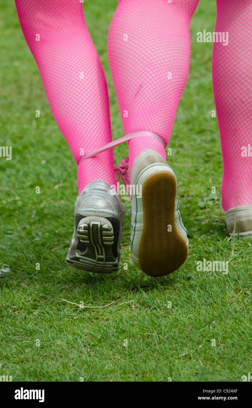 Three legged race hi-res stock photography and images - Alamy