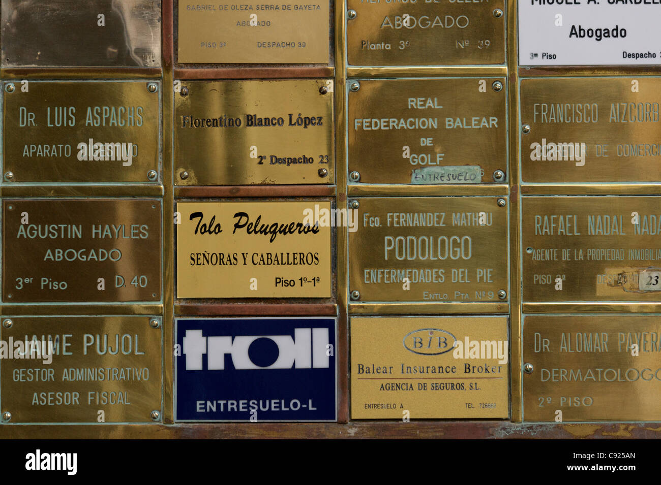 Collection Of Engraved Brass Name Plates On The Front Of A Building In 