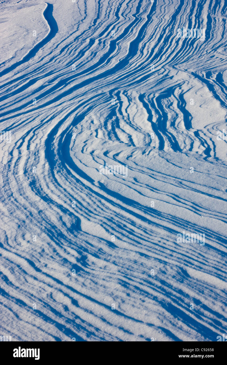 Detail view of Sastrugi, wind carved ridges in the snow, along the ...