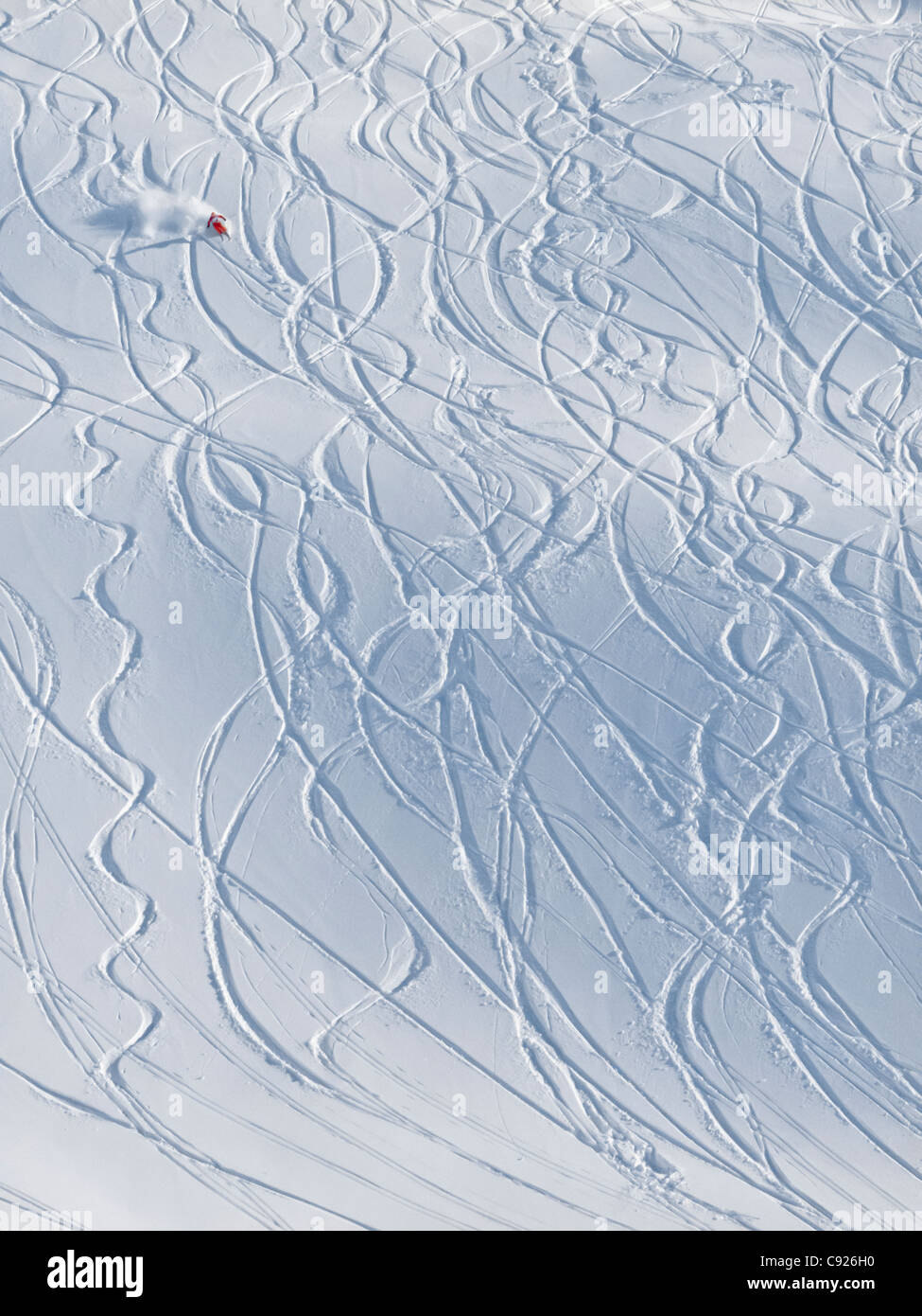 Skier descending a steep slope hi-res stock photography and images - Alamy