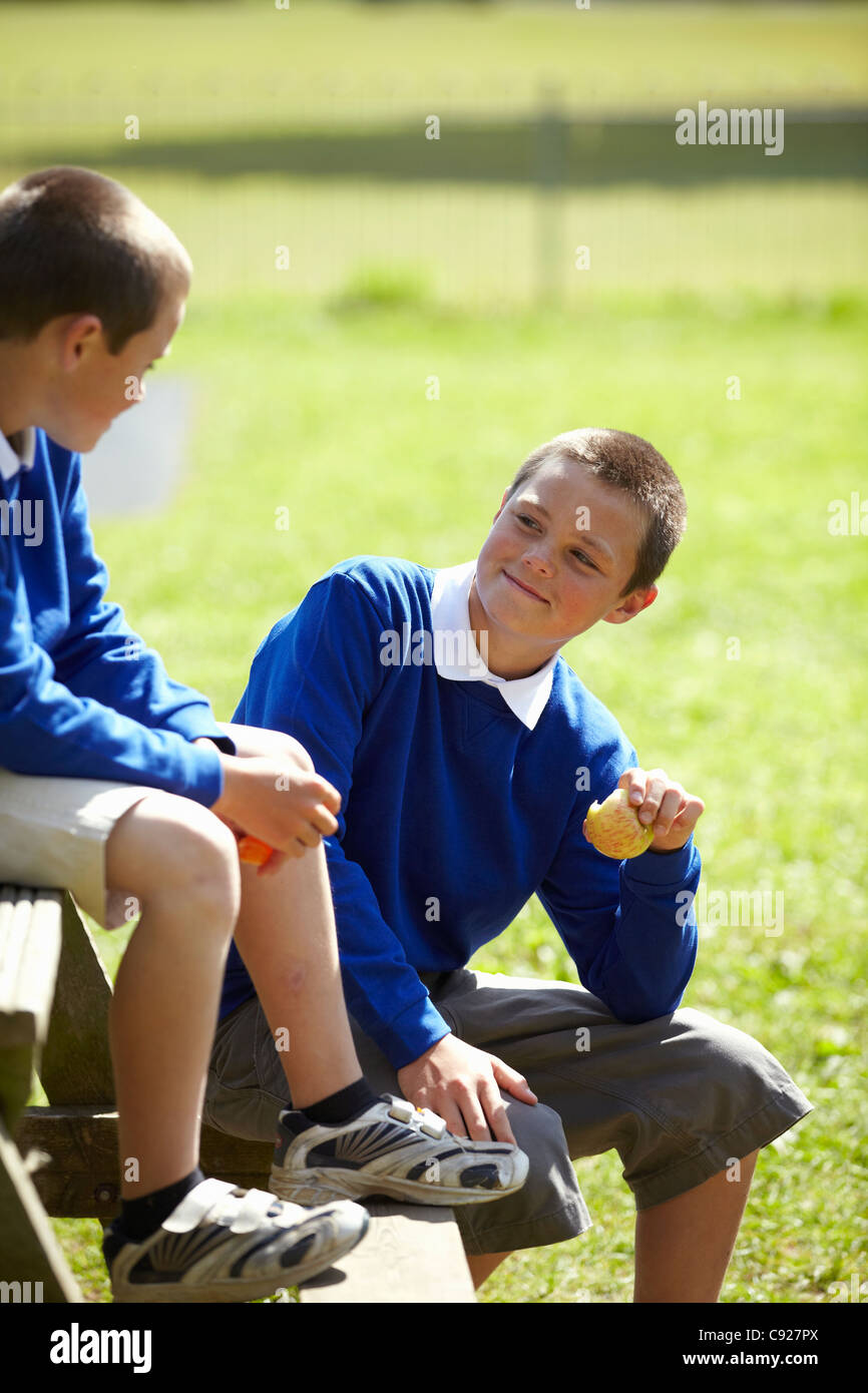 Students eating together outdoors Stock Photo - Alamy