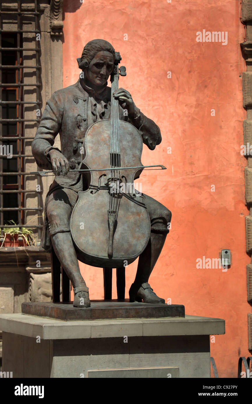 A statue of the famed composer and cellist Luigi Boccherini playing the ...
