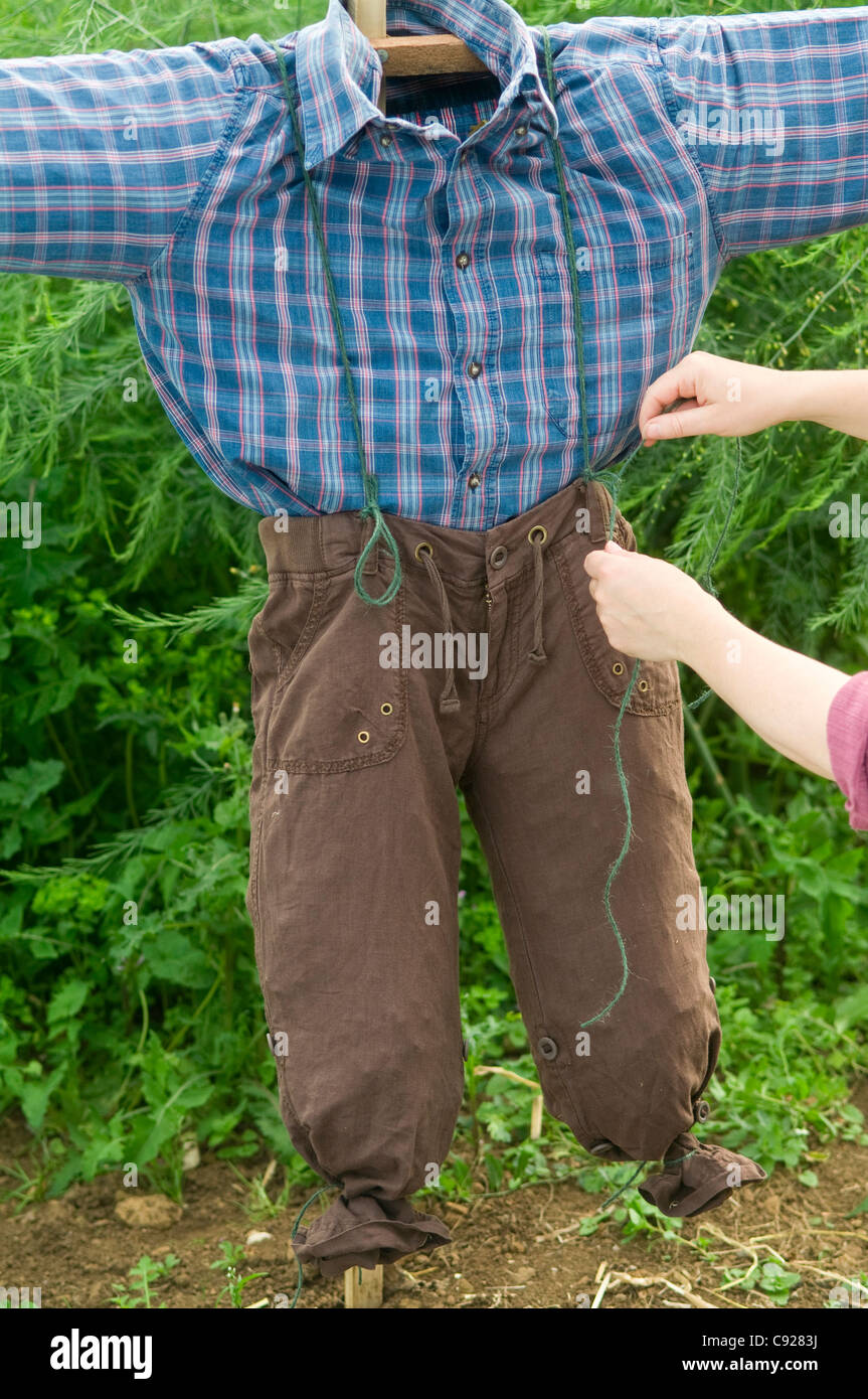 Person making scarecrow hi-res stock photography and images - Alamy