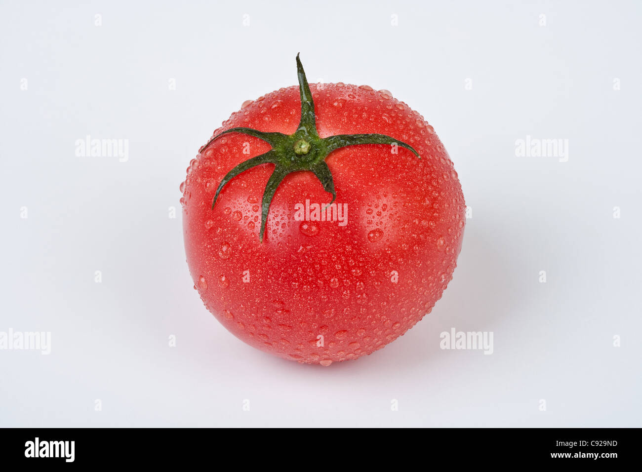 A red fresh tomato Stock Photo - Alamy