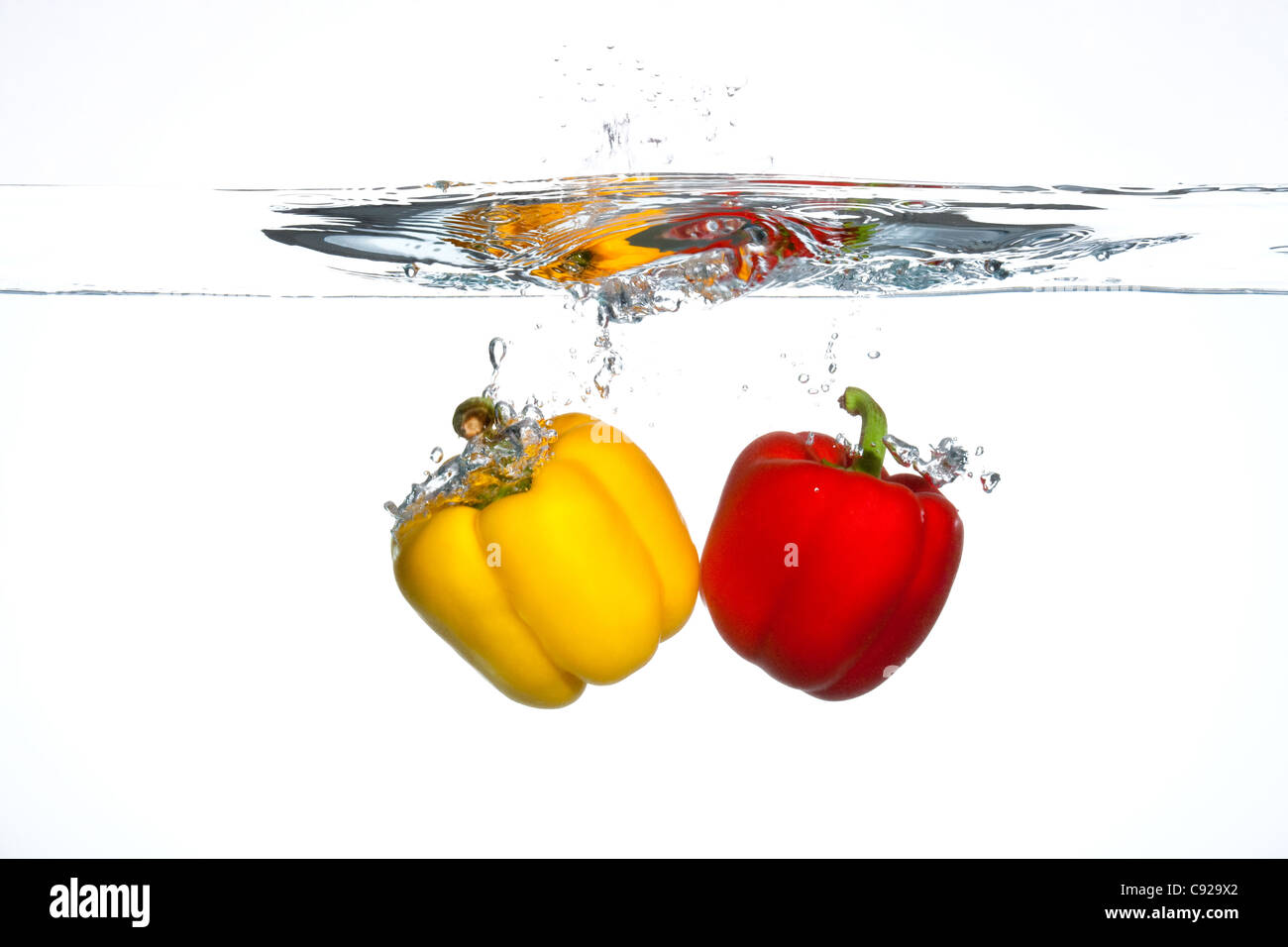 Bell peppers splashing in water Stock Photo - Alamy