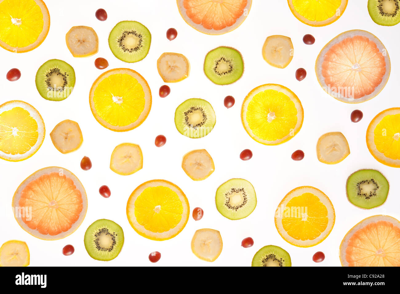 Thinly sliced citrus fruit and kiwi fruit Stock Photo - Alamy