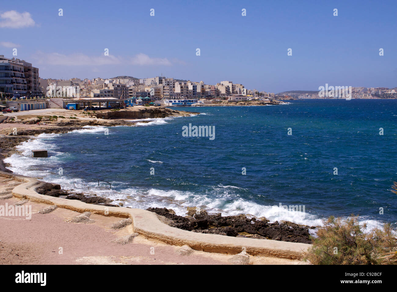 High rise hotels and apartments along the promenade in Bugibba with a ...