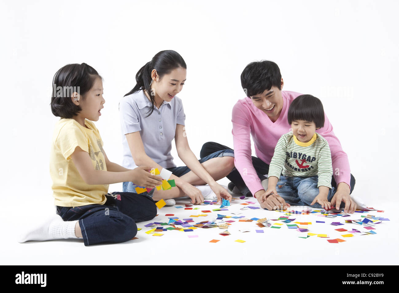 Family mother two children playing Cut Out Stock Images & Pictures - Alamy