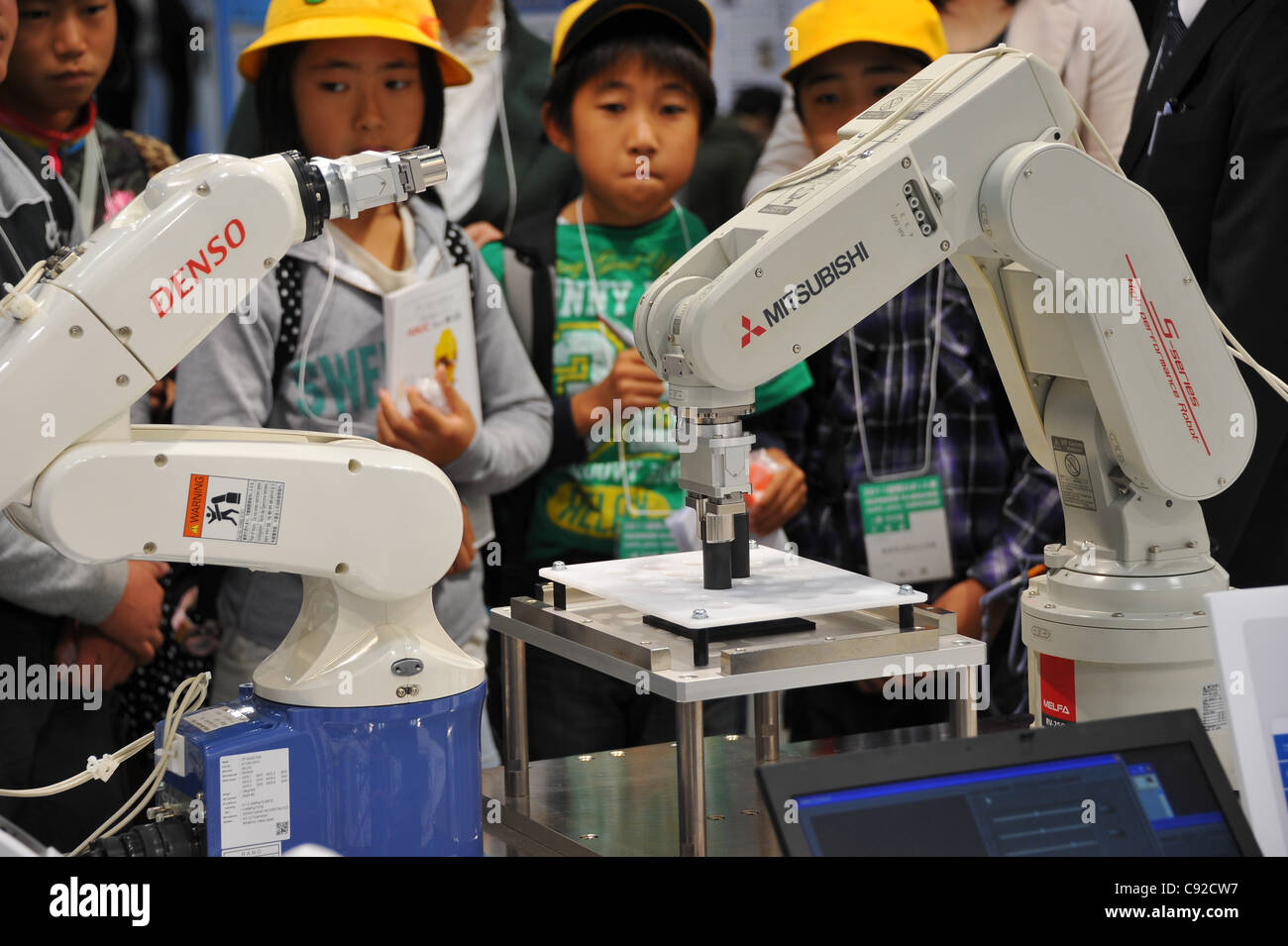 November 9, 2011, Tokyo, Japan - School children view industrial robots ...