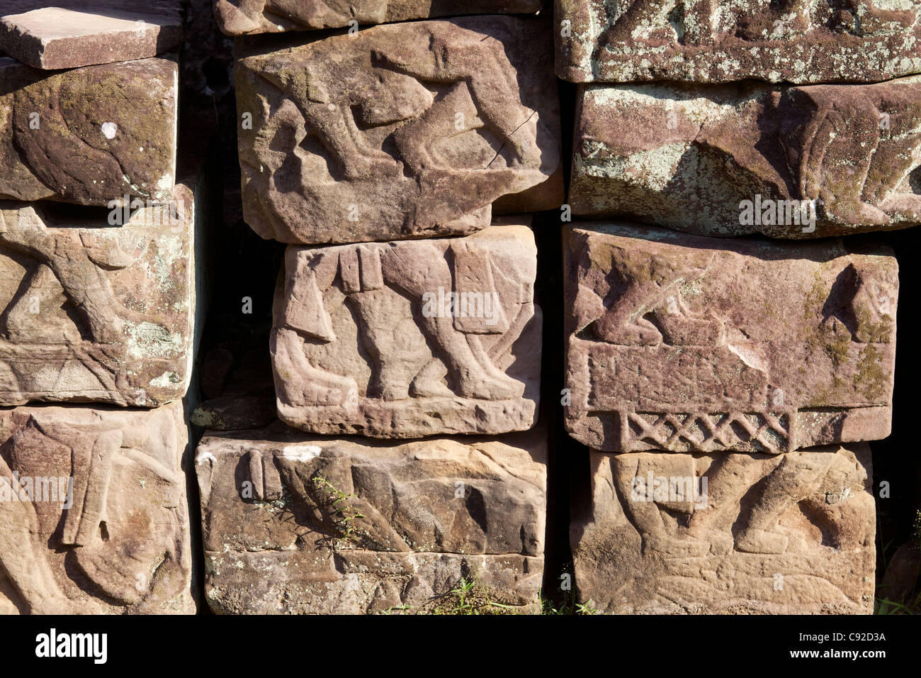 Collection of broken carved stone bas-reliefs from the walls of the ...
