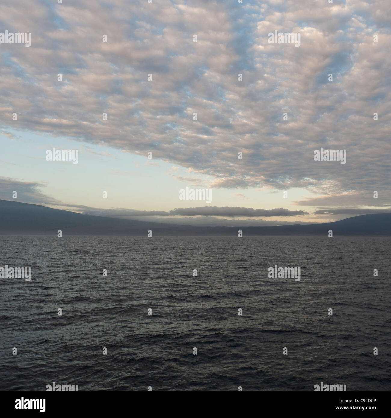 Clouds over the Pacific Ocean at sunset, Isabela Island, Galapagos ...