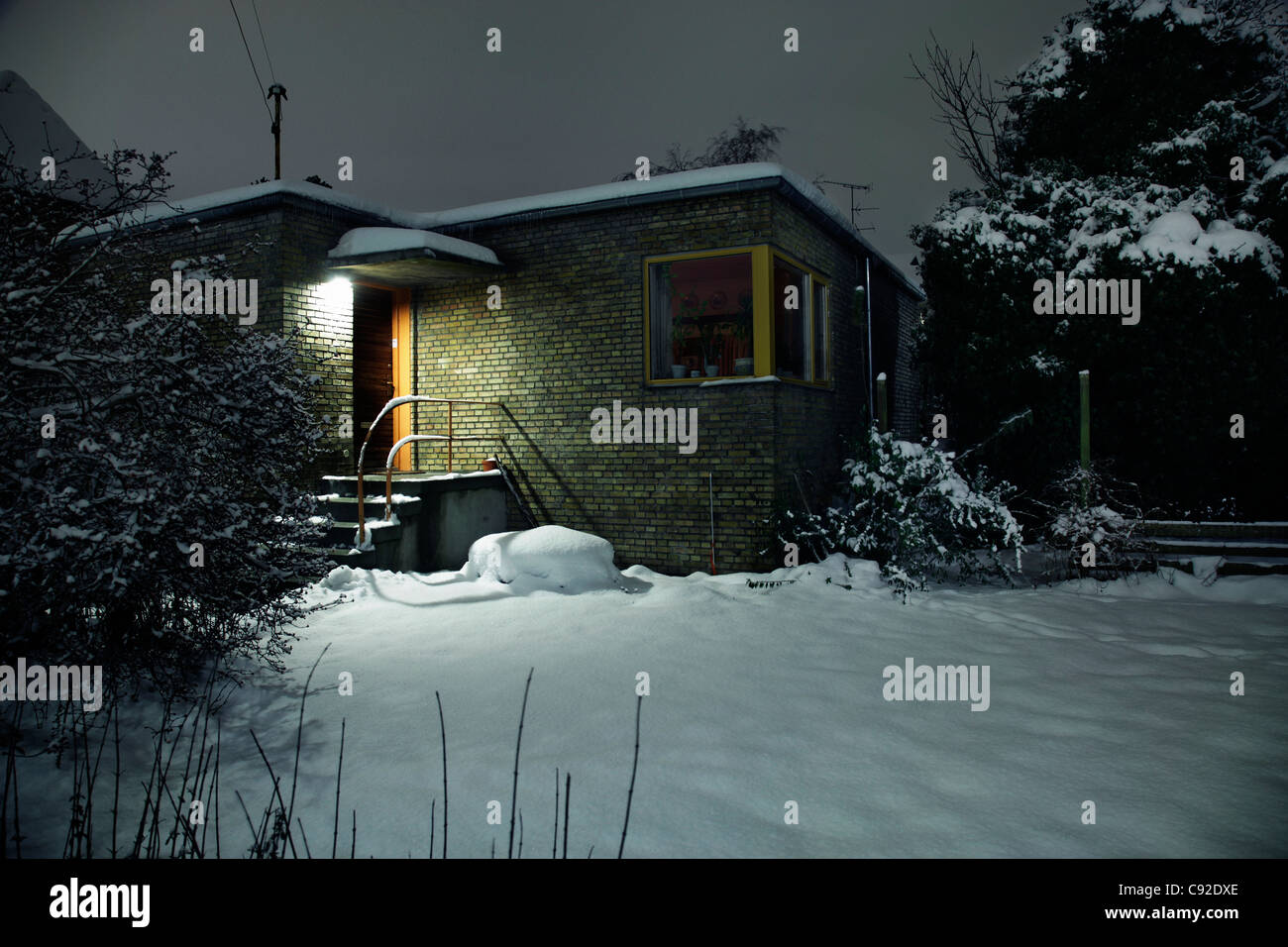 Snow covered house and front yard Stock Photo - Alamy