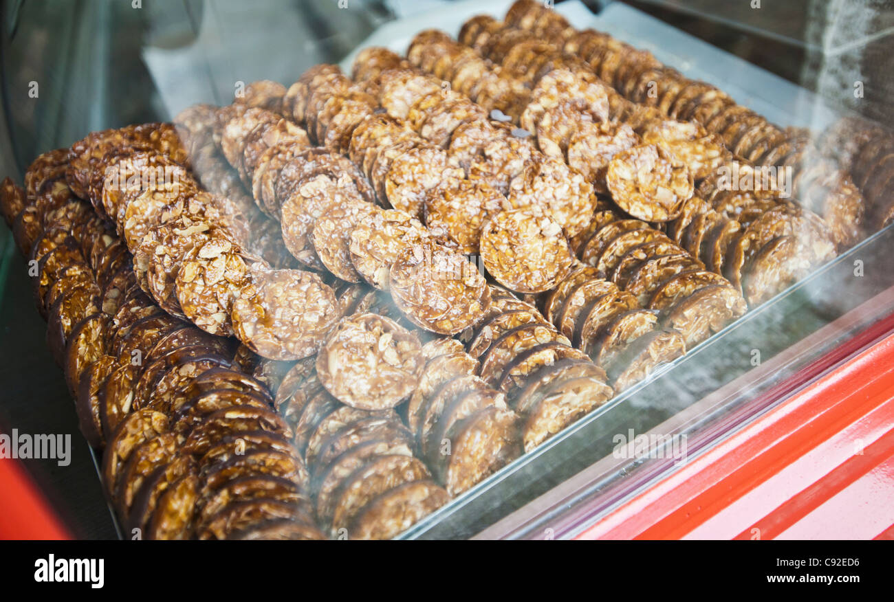 Close up of cookies in display case Stock Photo - Alamy