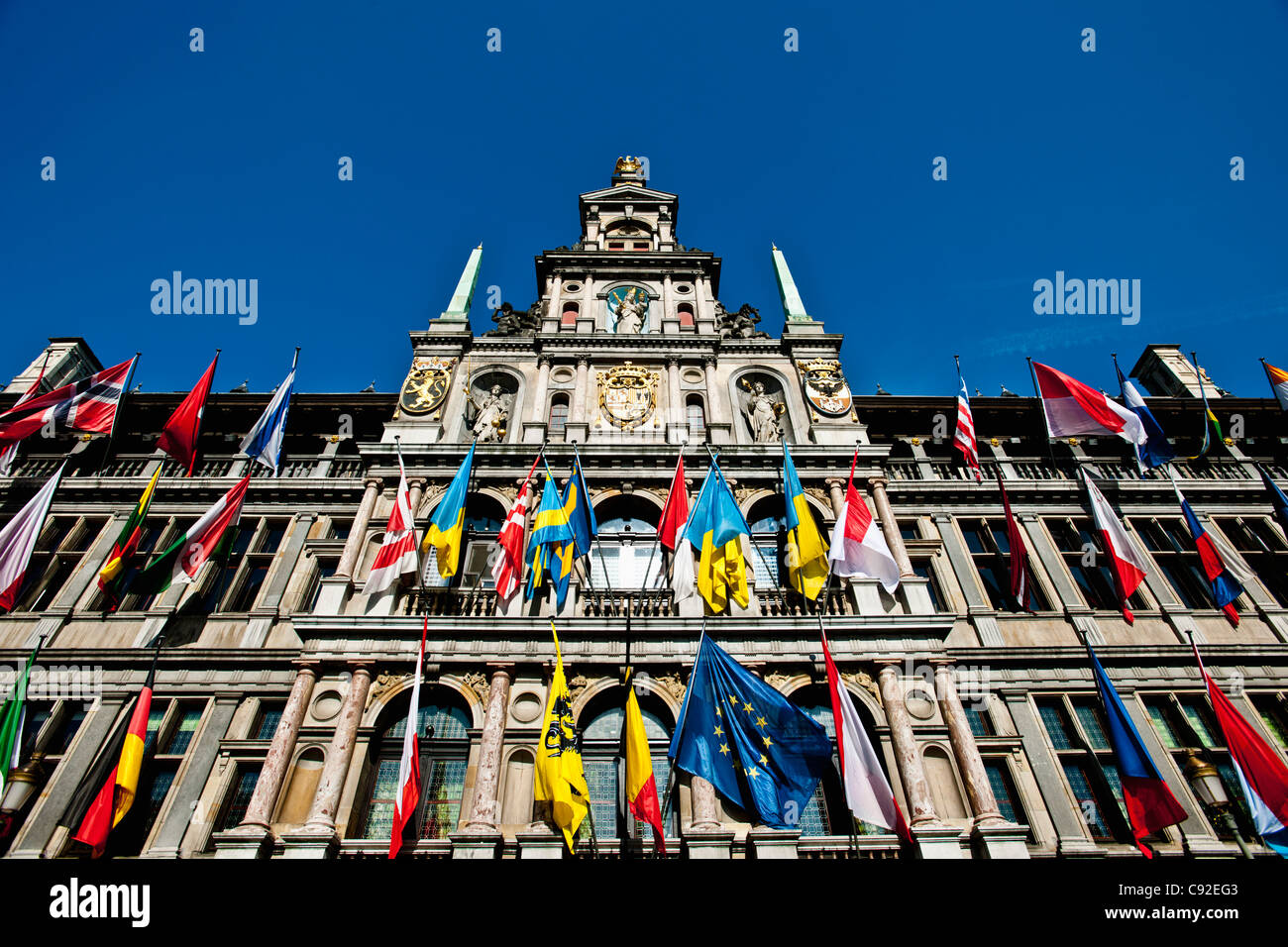 Flags on ornate building Stock Photo - Alamy