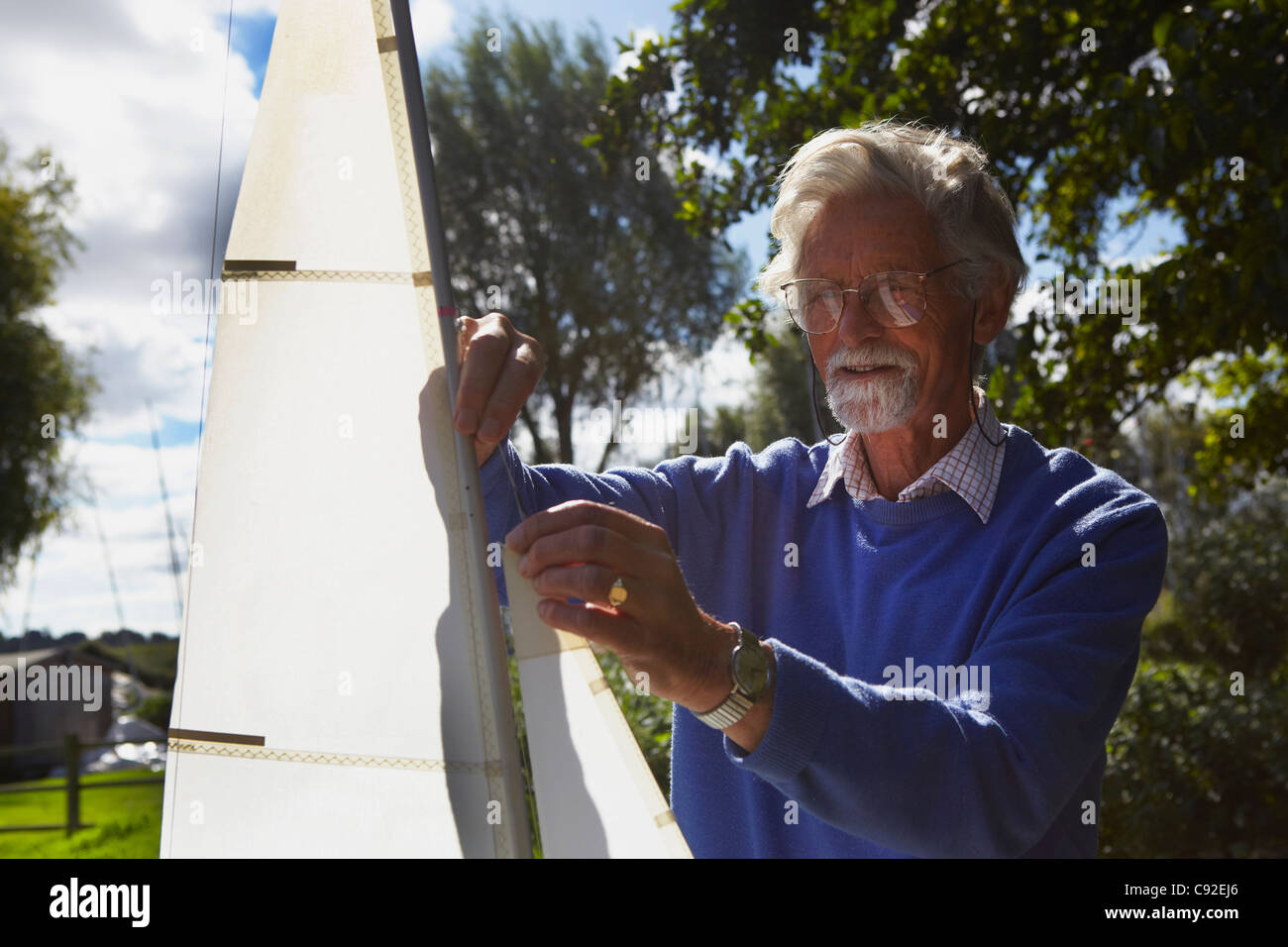 man with model yacht Stock Photo - Alamy