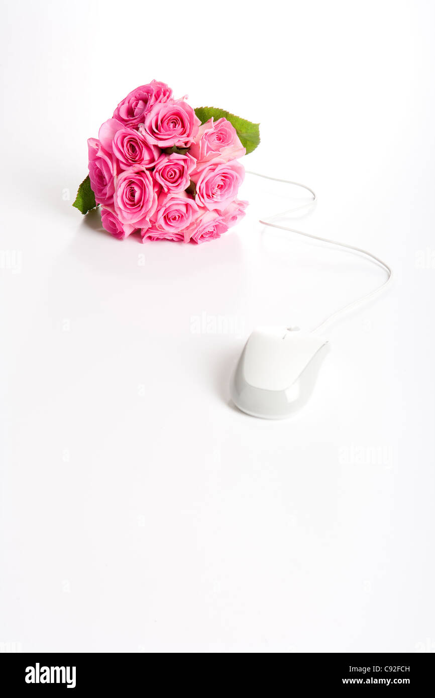 Computer mice with bunch of flowers Stock Photo - Alamy