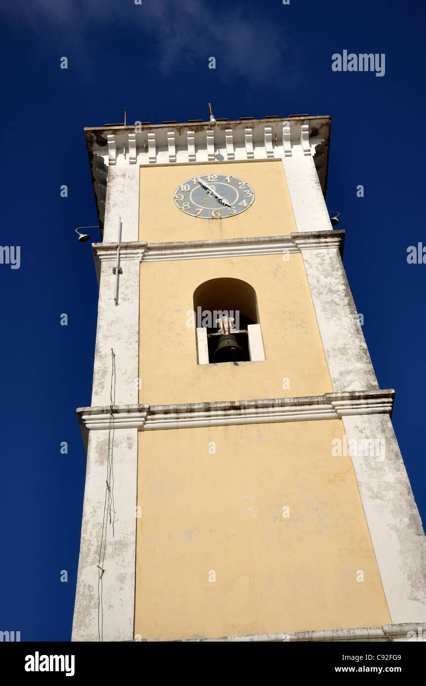 there is a tall clock tower in the Cathedral of Nossa Senhora de ...