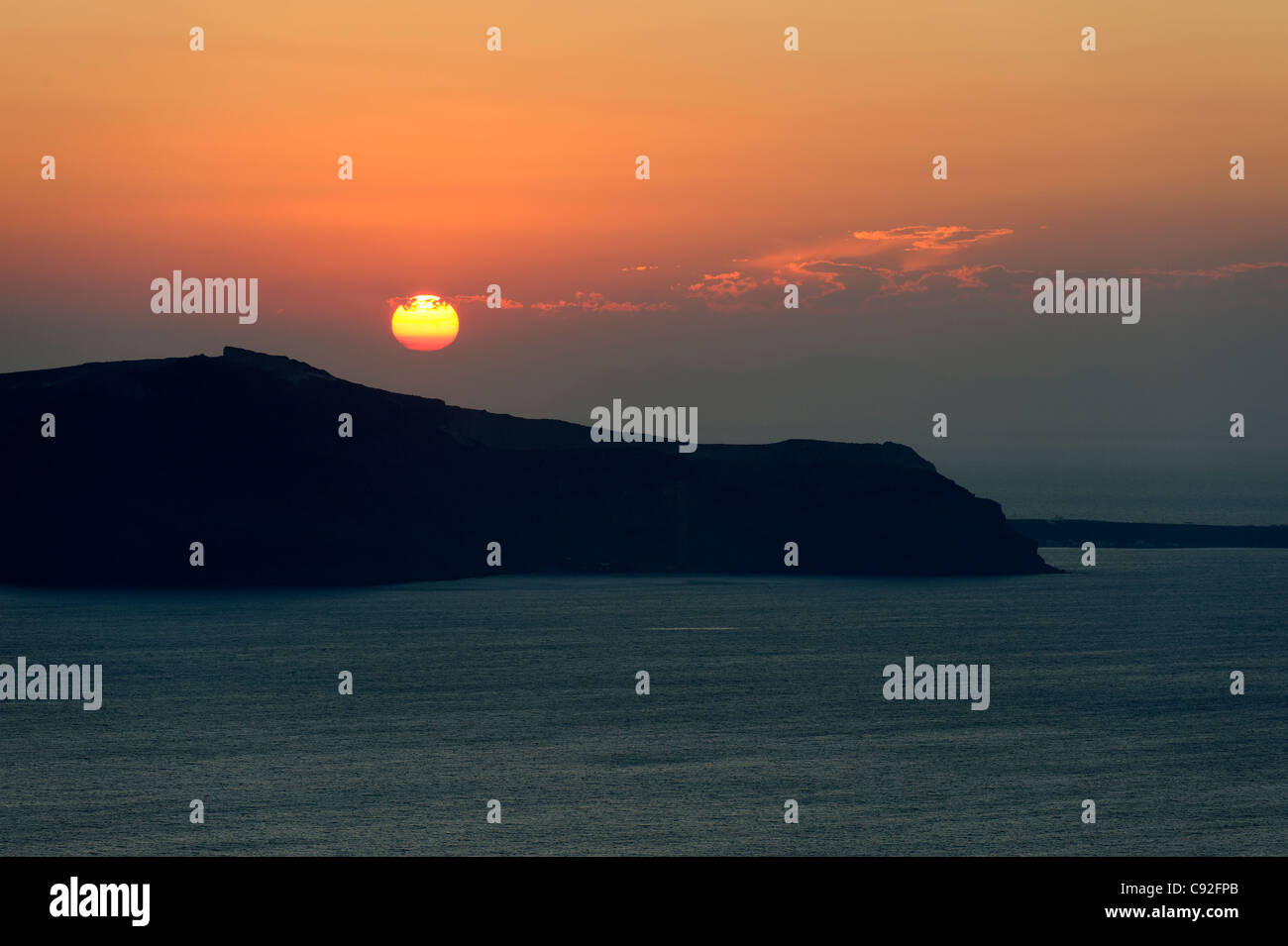 Cyclades. Greece. View of the famous golden orange romantic Santorini ...