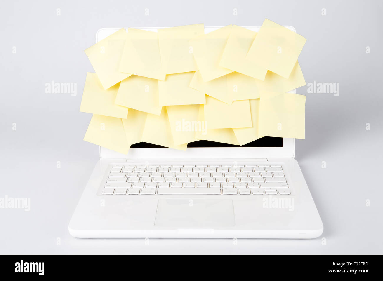 Sticky notes covering laptop monitor Stock Photo - Alamy