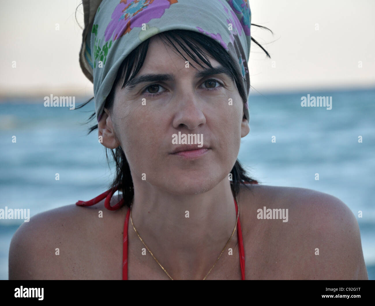 Beautiful woman with black head scarf hi-res stock photography and ...