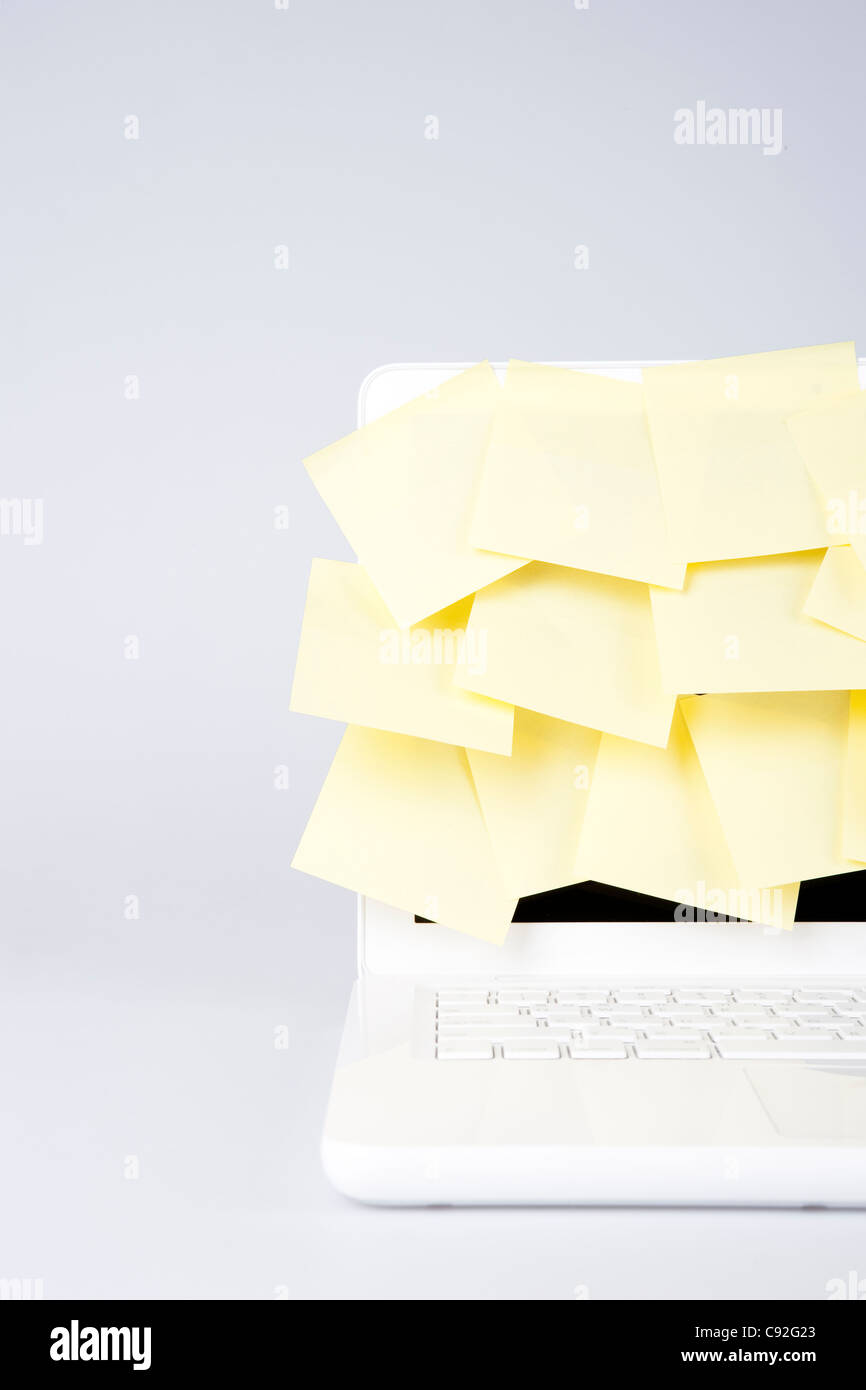 Sticky notes covering laptop monitor Stock Photo - Alamy