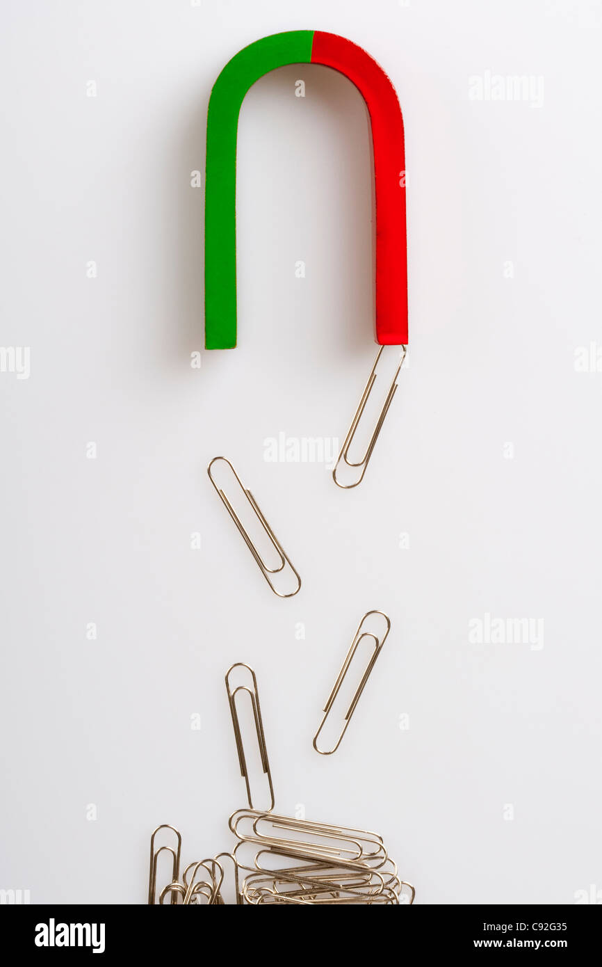 Magnet pulling objects hi-res stock photography and images - Alamy