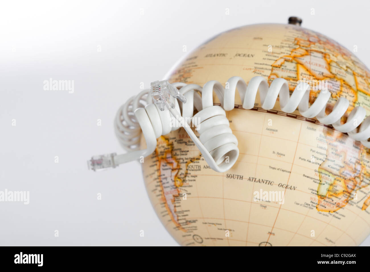 A globe wrapped in Ethernet port cable Stock Photo - Alamy