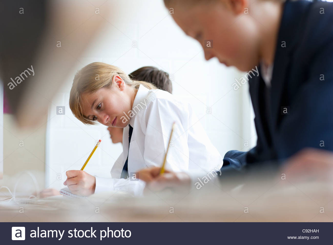 Students Writing Exam Uniform Stock Photos & Students Writing Exam ...