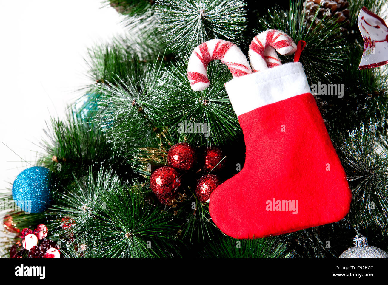 Christmas tree decorated with socks and baubles Stock Photo - Alamy