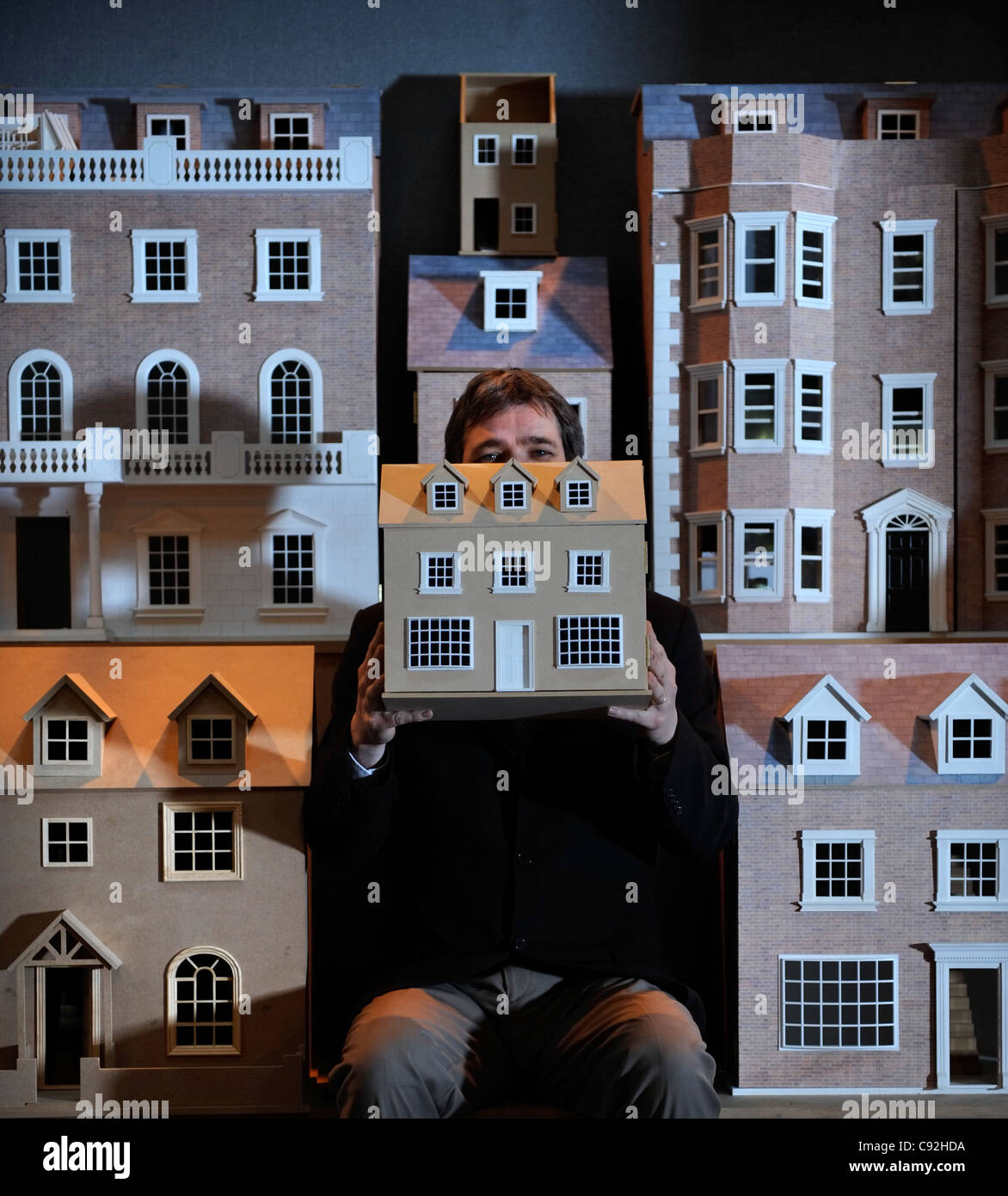 A miniatura enthusiast with his Georgian style dolls' houses at the ...