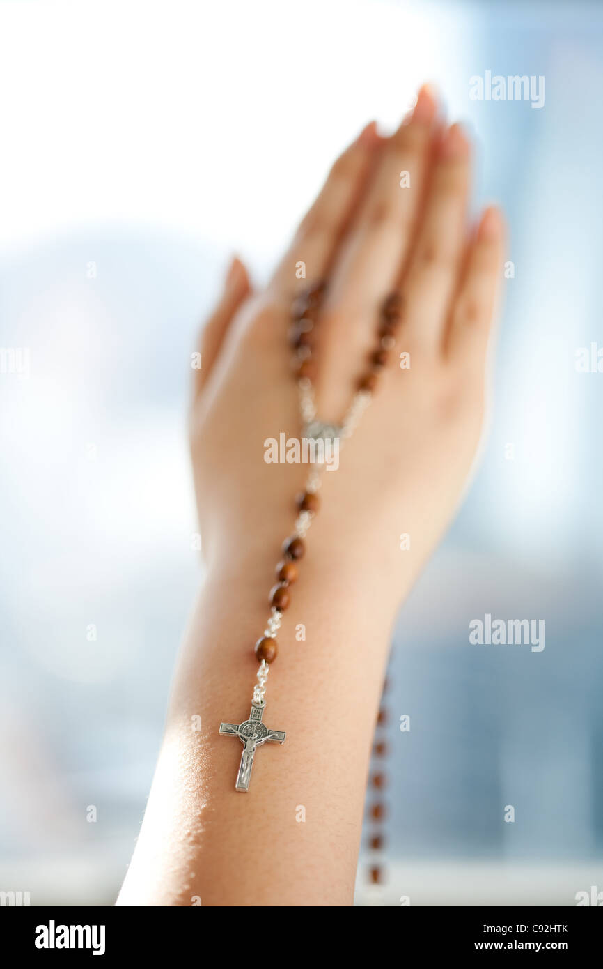 Human hand holding crucifix, part of Stock Photo - Alamy