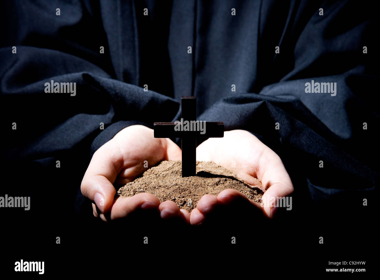 Human hand holding crucifix Stock Photo - Alamy