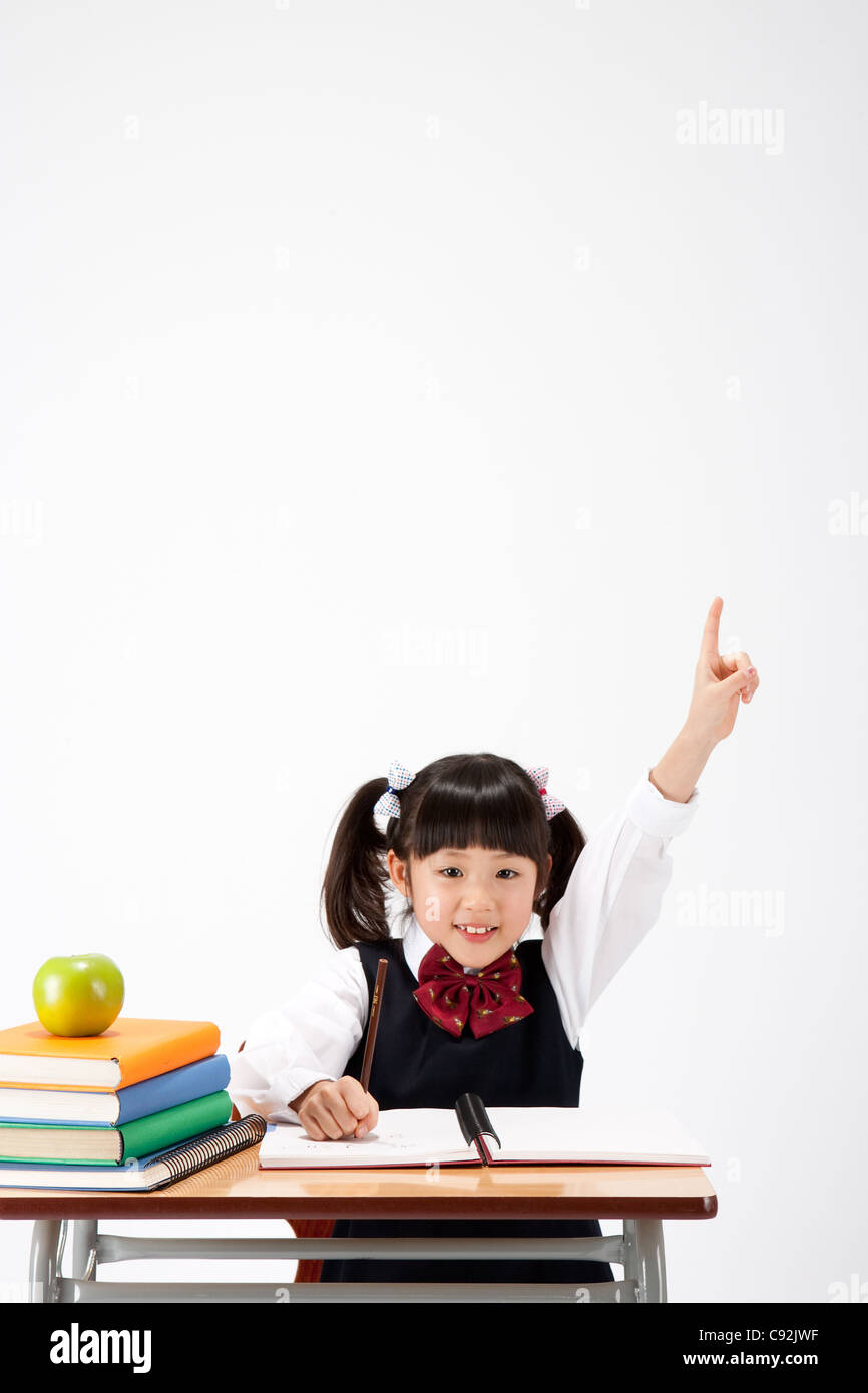 Raised hands school uniform group hi-res stock photography and images ...