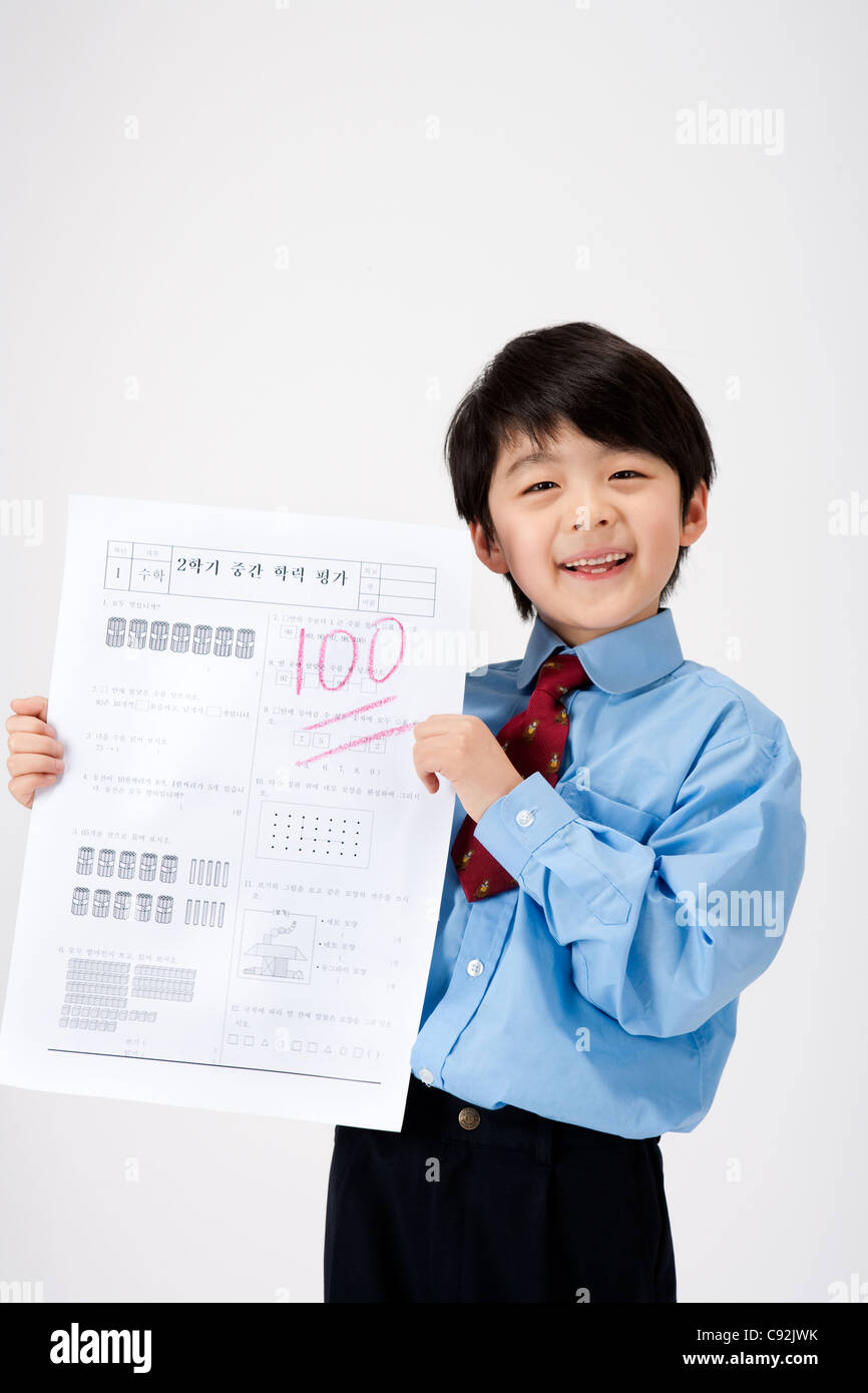 Asian smart boy smiling camera hi-res stock photography and images - Alamy
